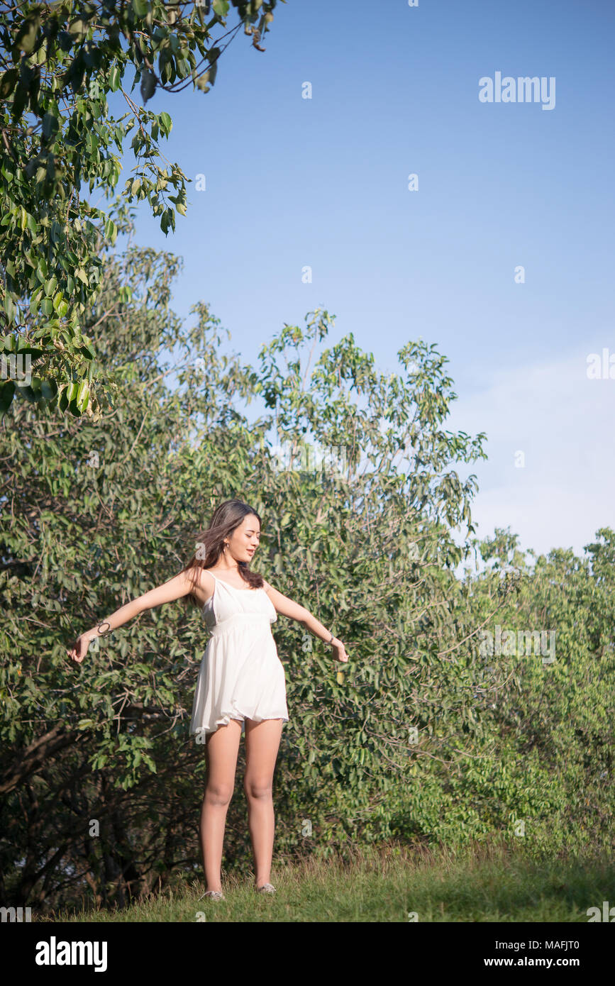 Beautiful woman outside at nature park,Free Happy Woman Enjoying Nature ...