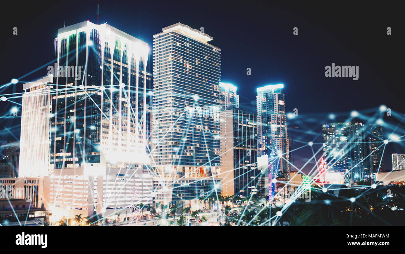 Abstract internet connection network with night city with skyscrapers ...