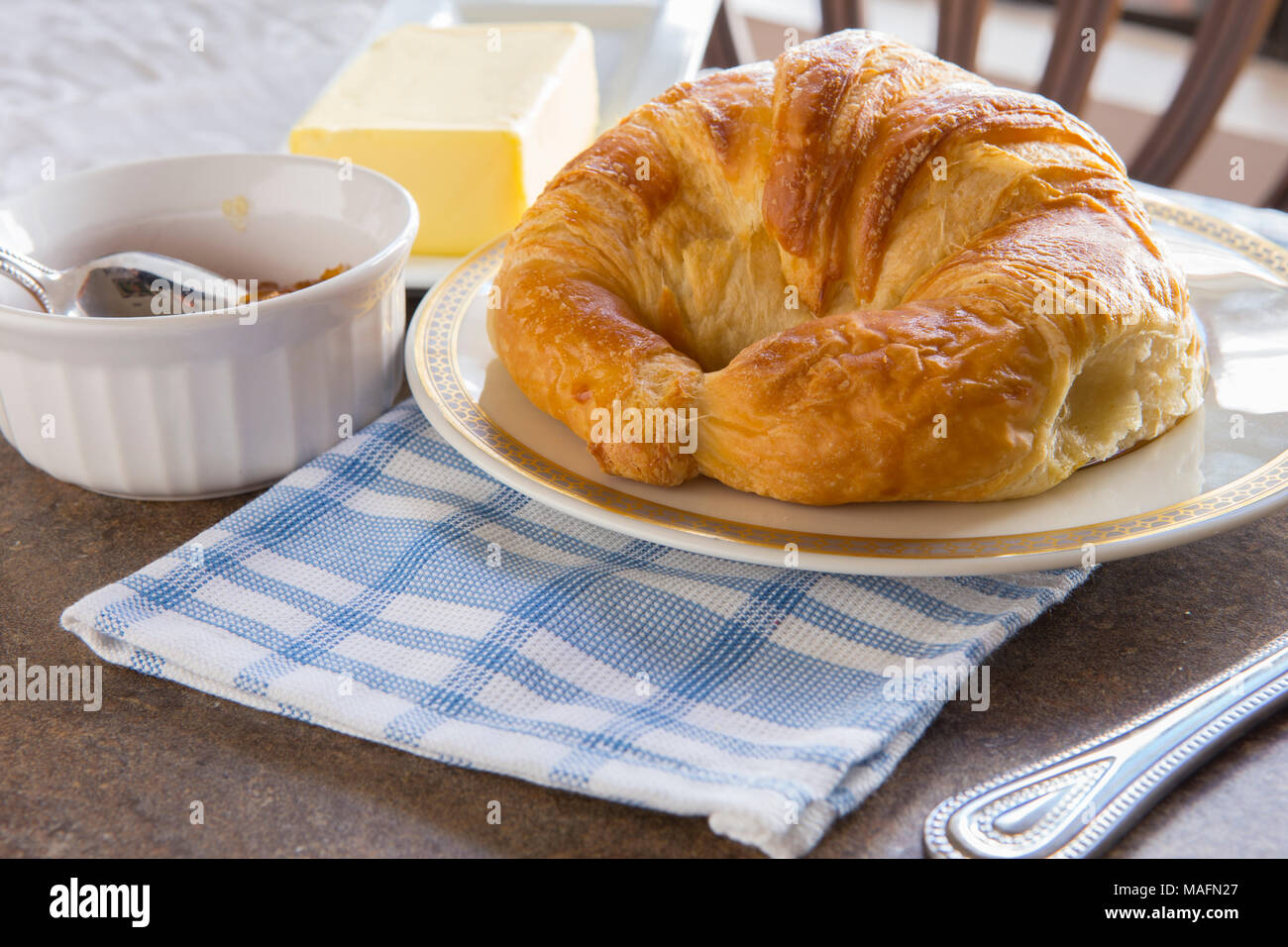 Food. crispy golden croissant with butter and breakfast marmalade Stock ...