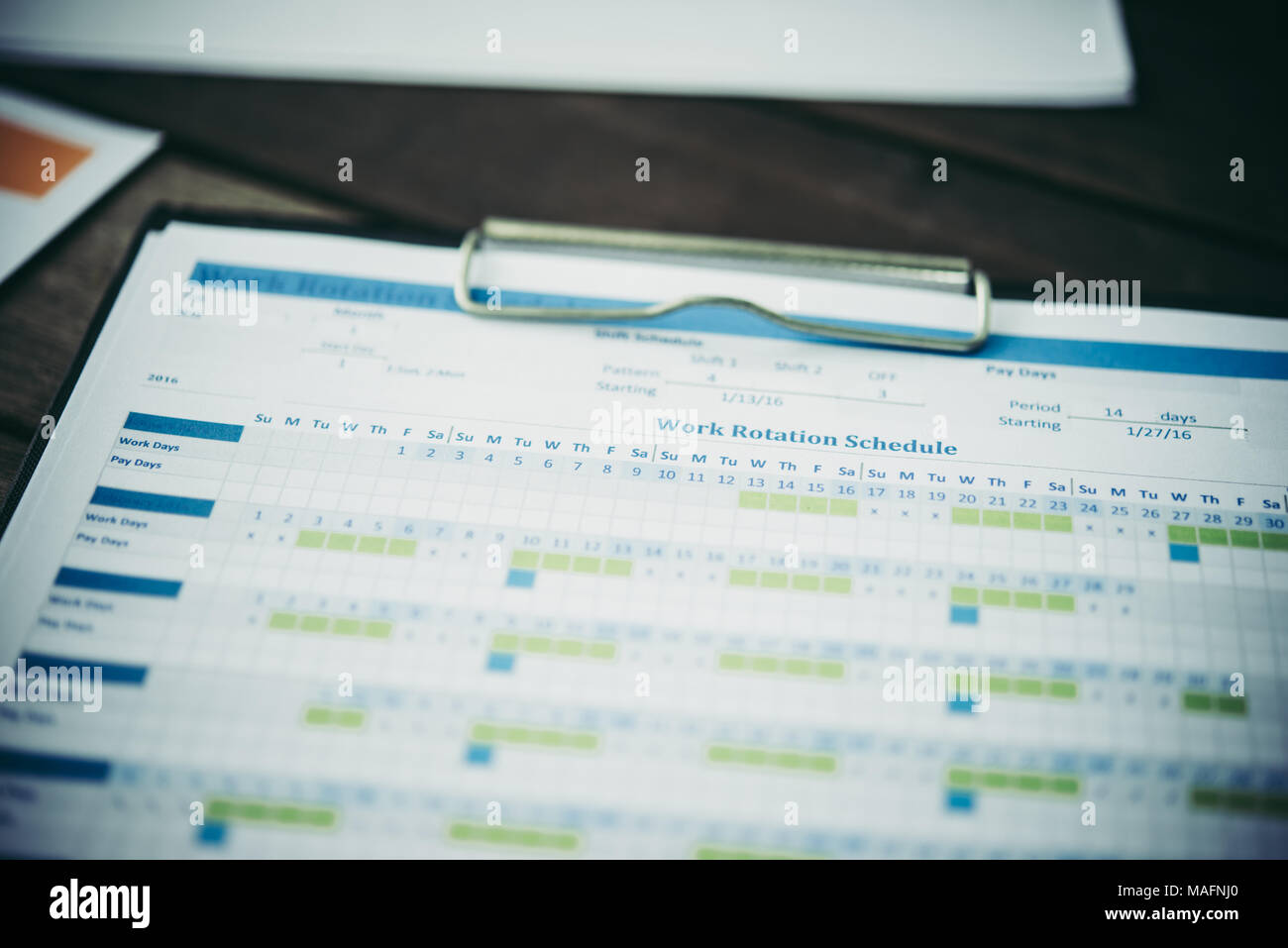 Preparing report. Business reports documents on wooden background Stock ...