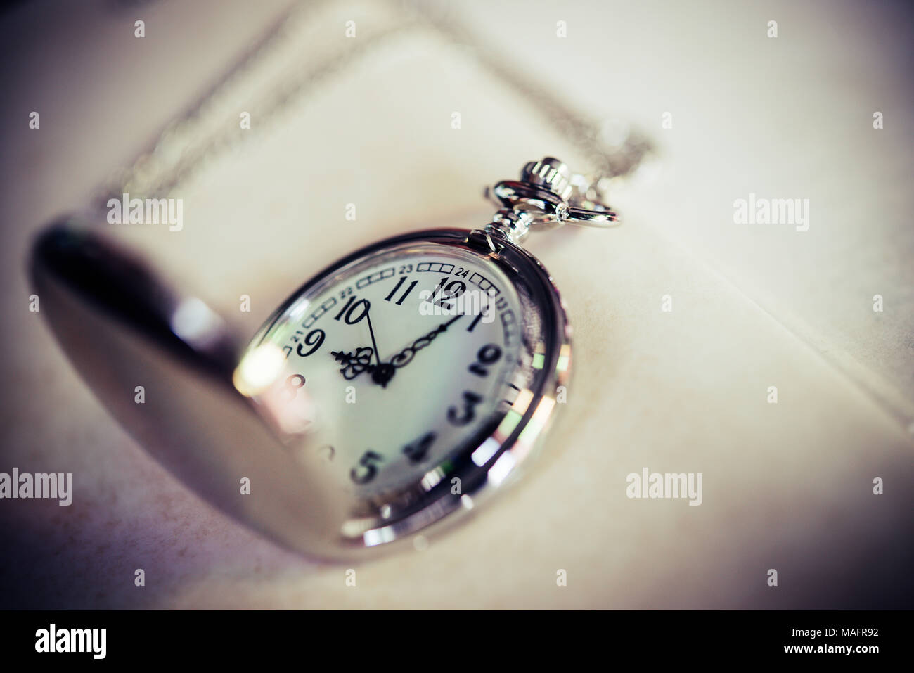 Vintage pocket watch , symbols of time with copy space Stock Photo - Alamy