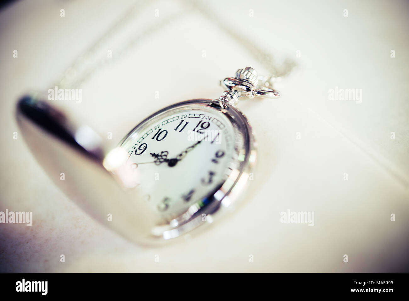 Vintage pocket watch , symbols of time with copy space Stock Photo - Alamy