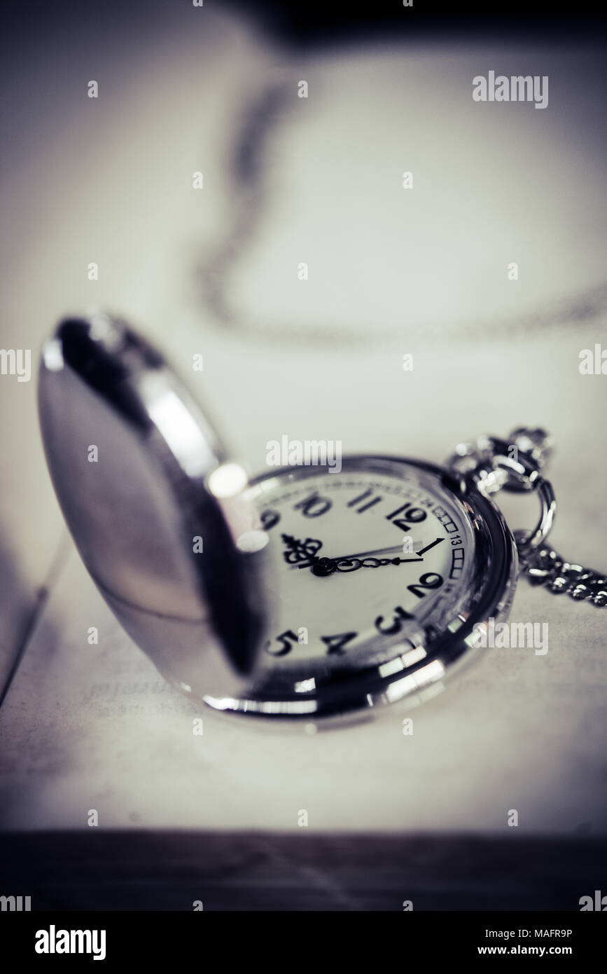 Vintage pocket watch , symbols of time with copy space Stock Photo - Alamy
