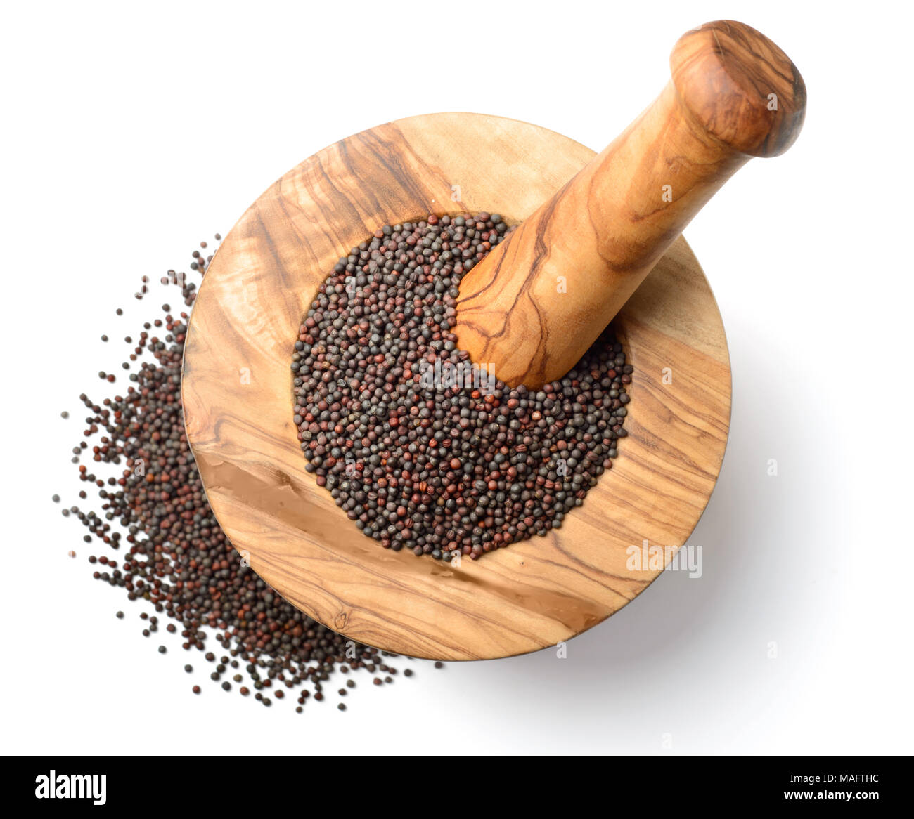dried canola seeds isolated on white background Stock Photo - Alamy