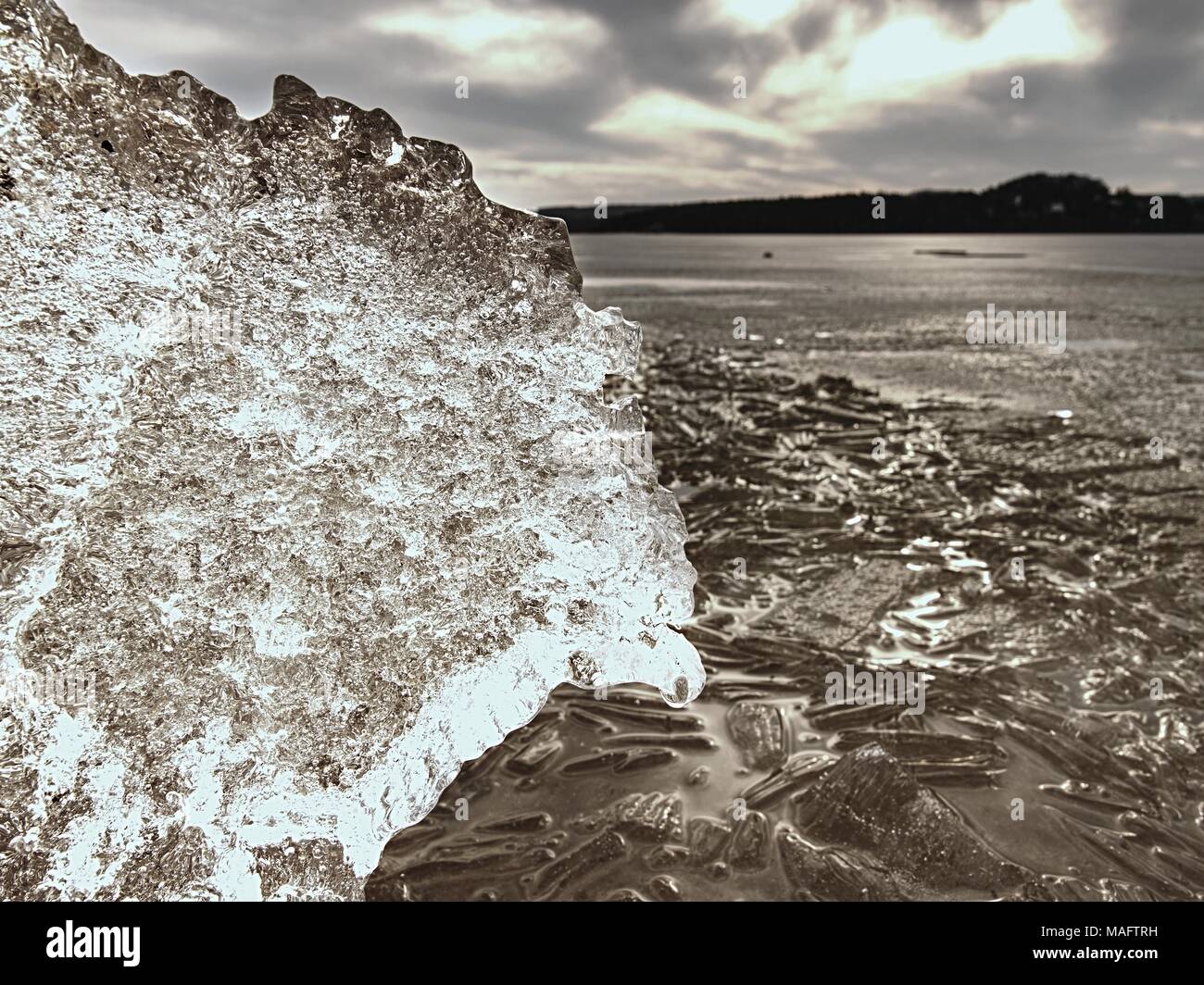 Frozen beach in cold winters day with colorful ice floe. Frozen icy ...