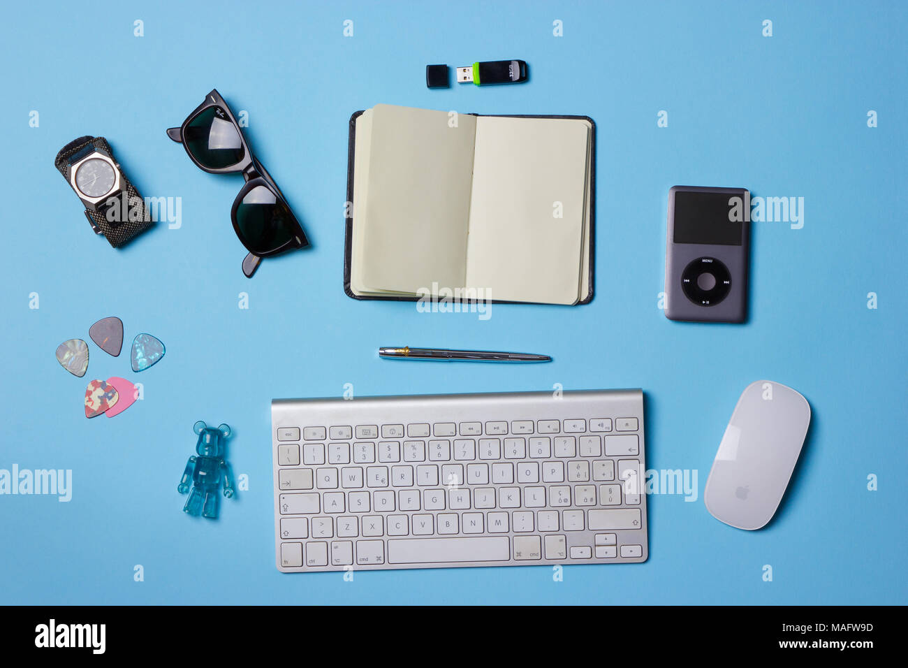 a beautiful light blue creative desk taken from above, still life Stock ...