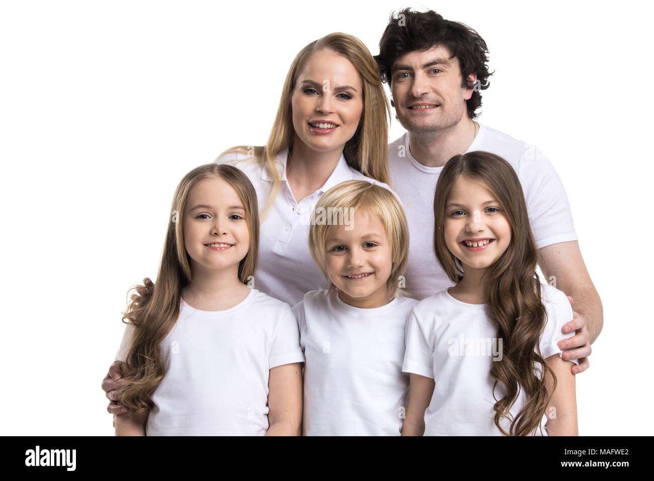 Portrait of happy smiling family of two parents and three children ...
