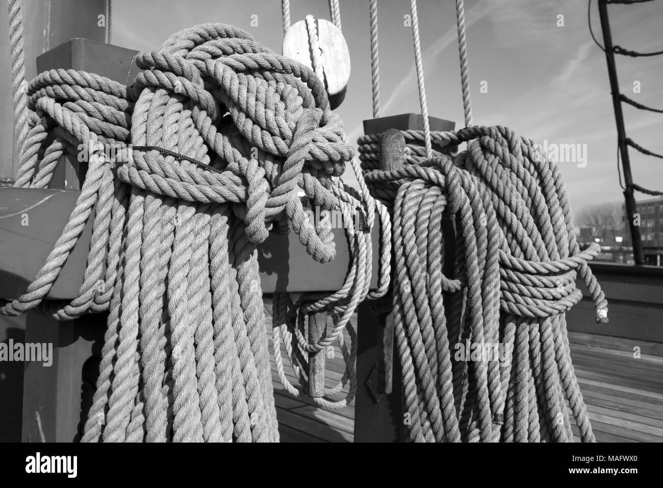 Ropes, pulley, shroud - parts of an old ship, sailboat. Black and white ...