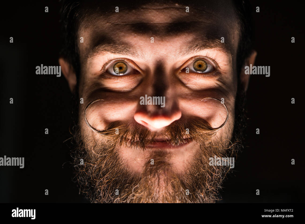 Smiling satan hi-res stock photography and images - Alamy