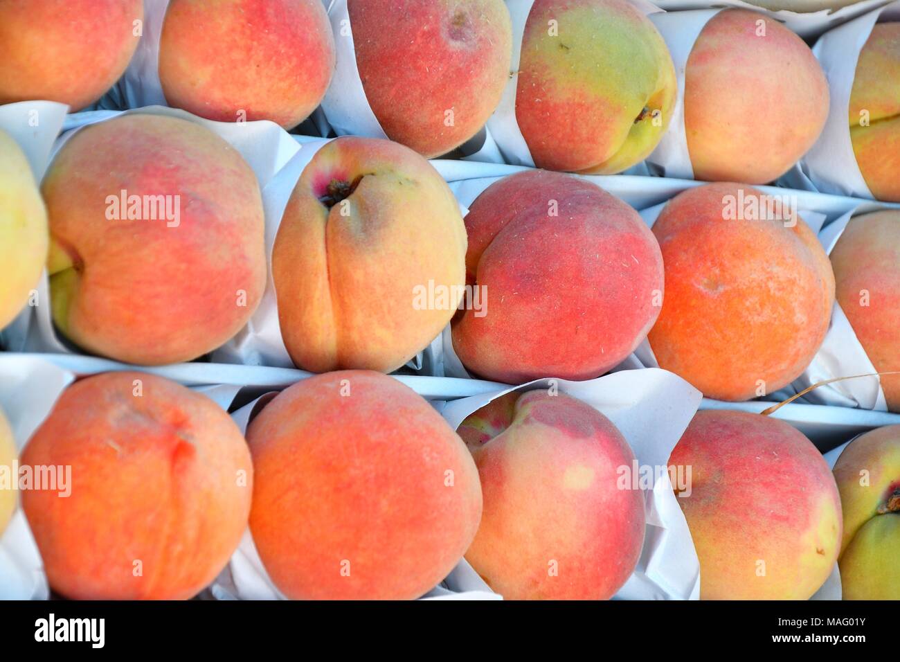 Fresh and ripe peaches are sold at the Bazaar Stock Photo - Alamy