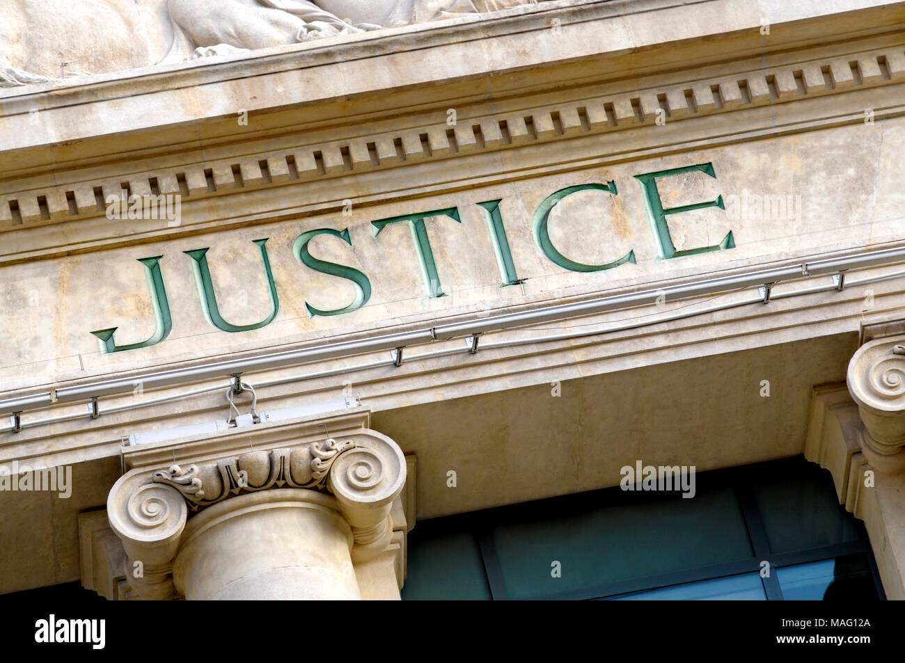 Justice sign on a Law Courts building Stock Photo - Alamy