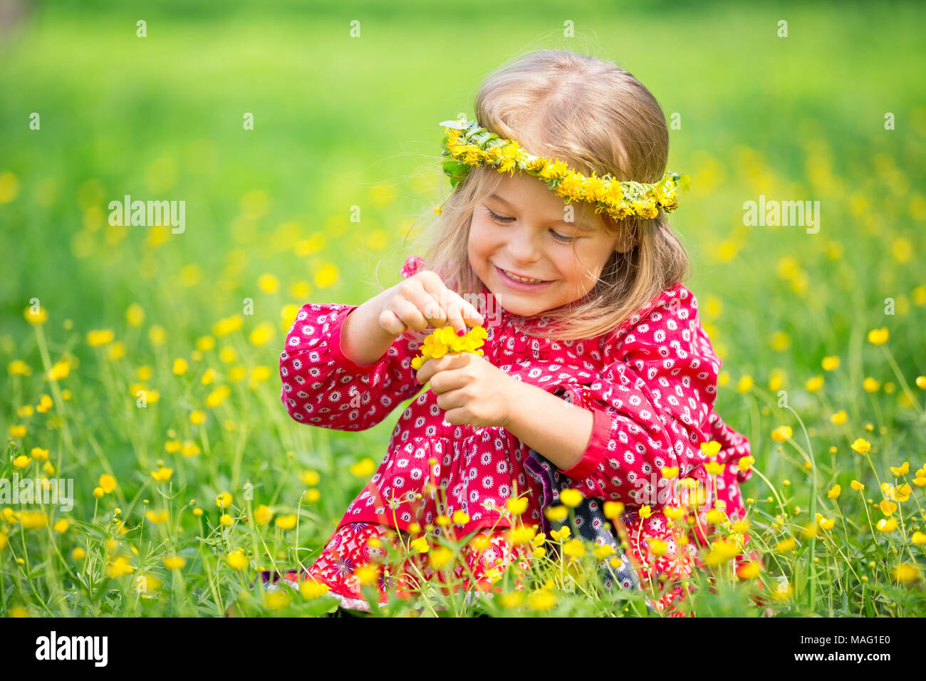 Little girl in spring park Stock Photo - Alamy