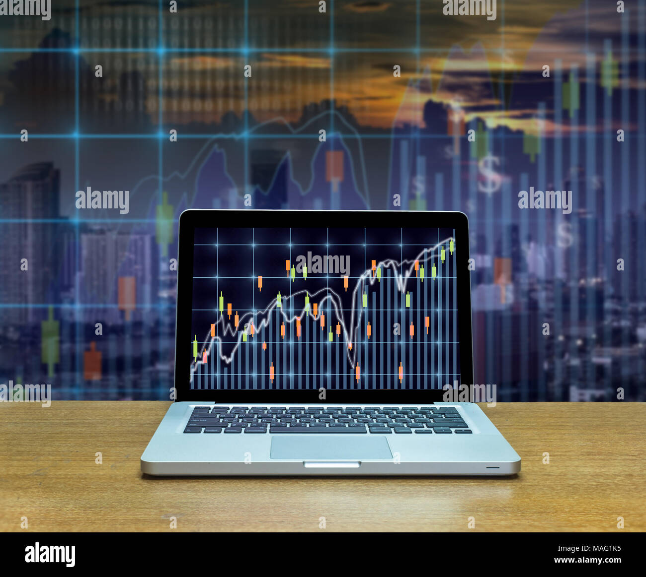 Stock exchange market trading graph over the screen of computer laptop ...