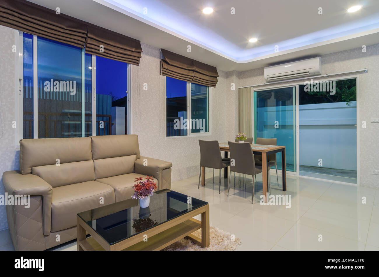 Luxury Interior living room with blue sky at twilight time Stock Photo ...