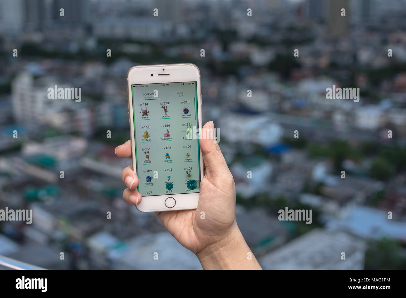 Bangkok, Thailand - Aug 7, 2016 : Hand holding Apple iPhone5 mobile ...