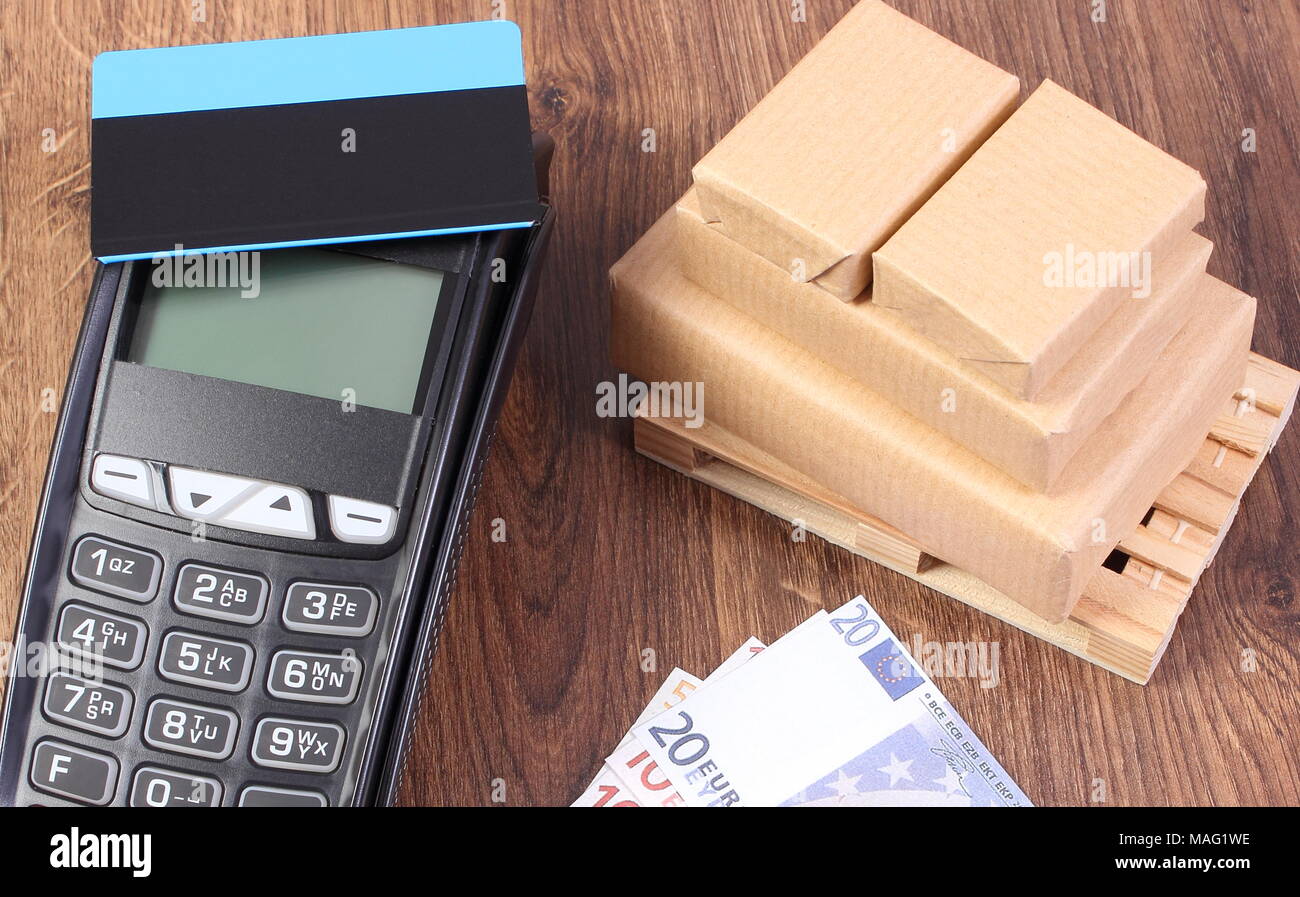 Payment terminal with contactless credit card, currencies euro and ...