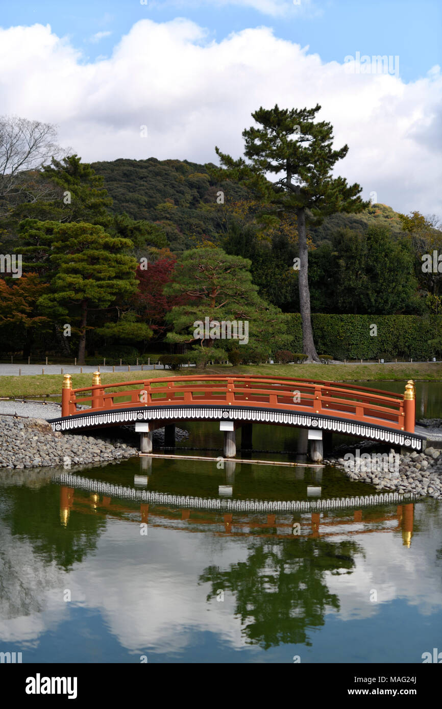 Soribashi, arched bridge reflecting in a pond of Phoenix Hall, Hoodo ...