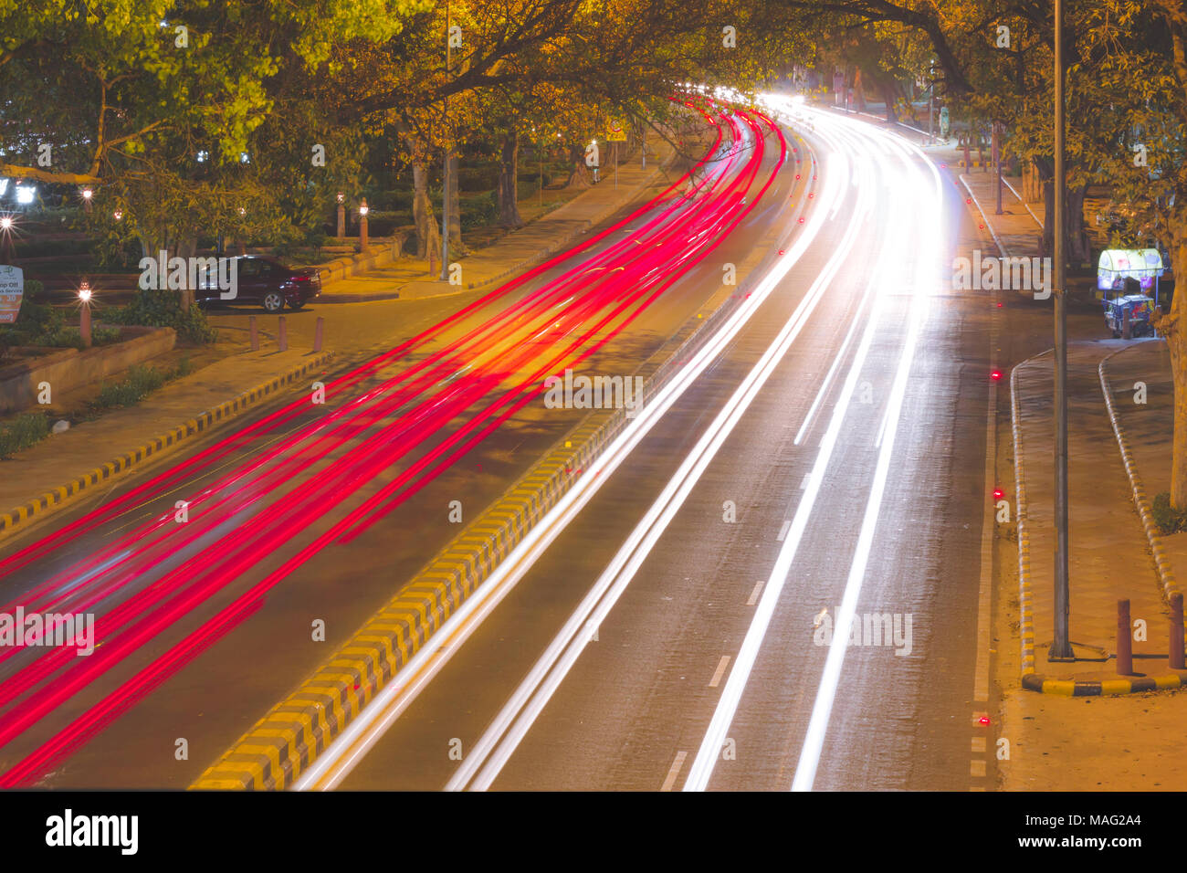 Light trails of cityscape in twilight at night Stock Photo - Alamy