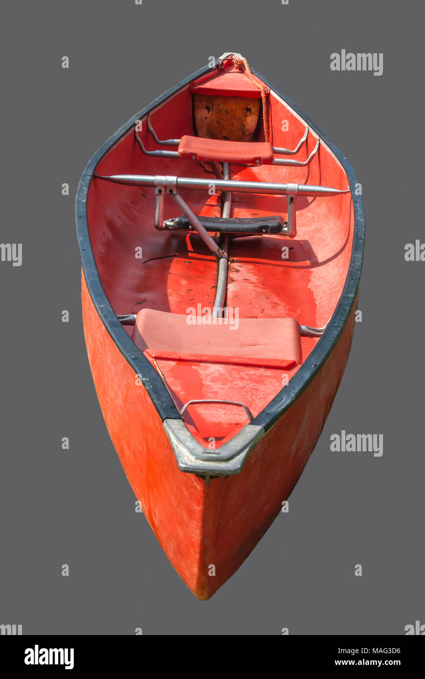 free-standing image photo of a used orange canoe Stock Photo - Alamy