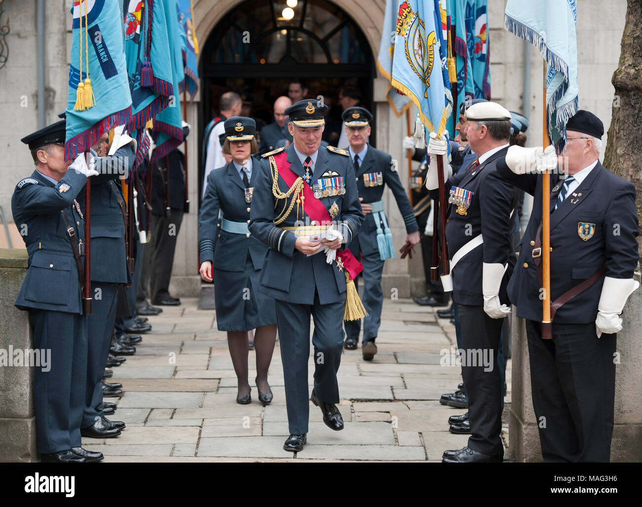 Serving and former RAF Officers leave St Clement Danes Church on The ...