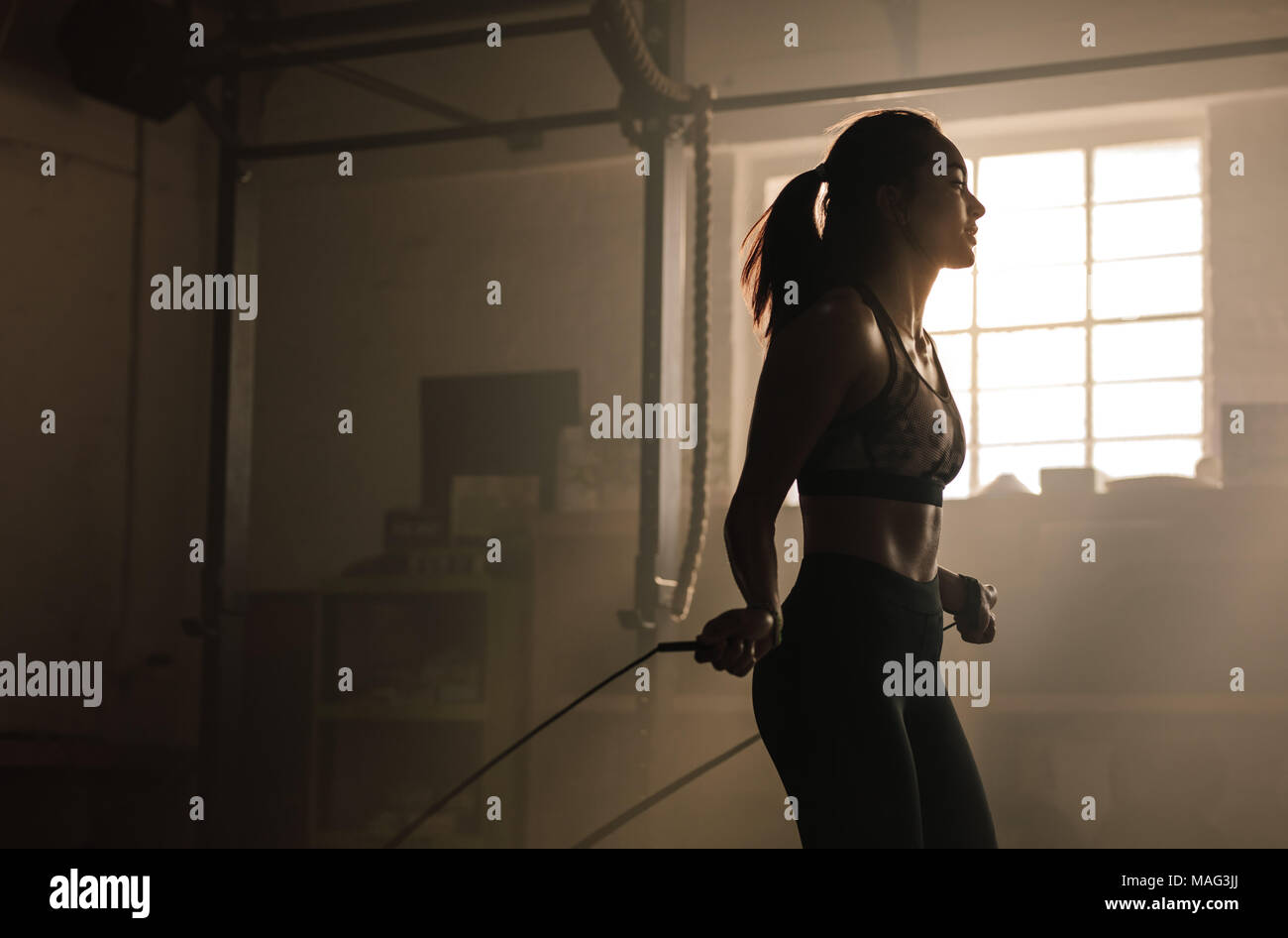 Person jumping rope in gym hi-res stock photography and images - Alamy