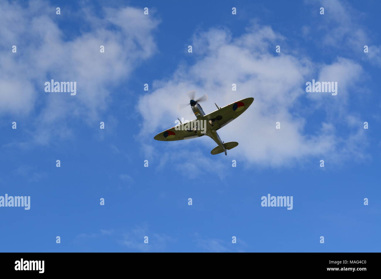 Supermarine Spitfire in flight showing its undercarriage Stock Photo ...