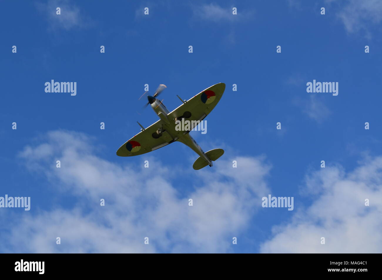 Supermarine Spitfire in flight showing its undercarriage Stock Photo ...