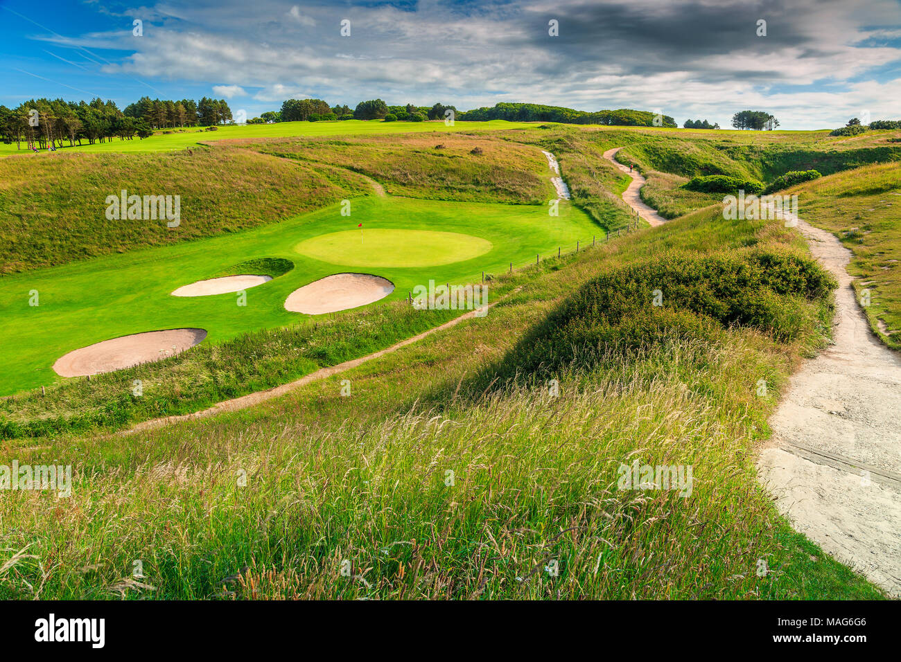 Stunning golf course with green fields and sand bunkers, France, Europe ...