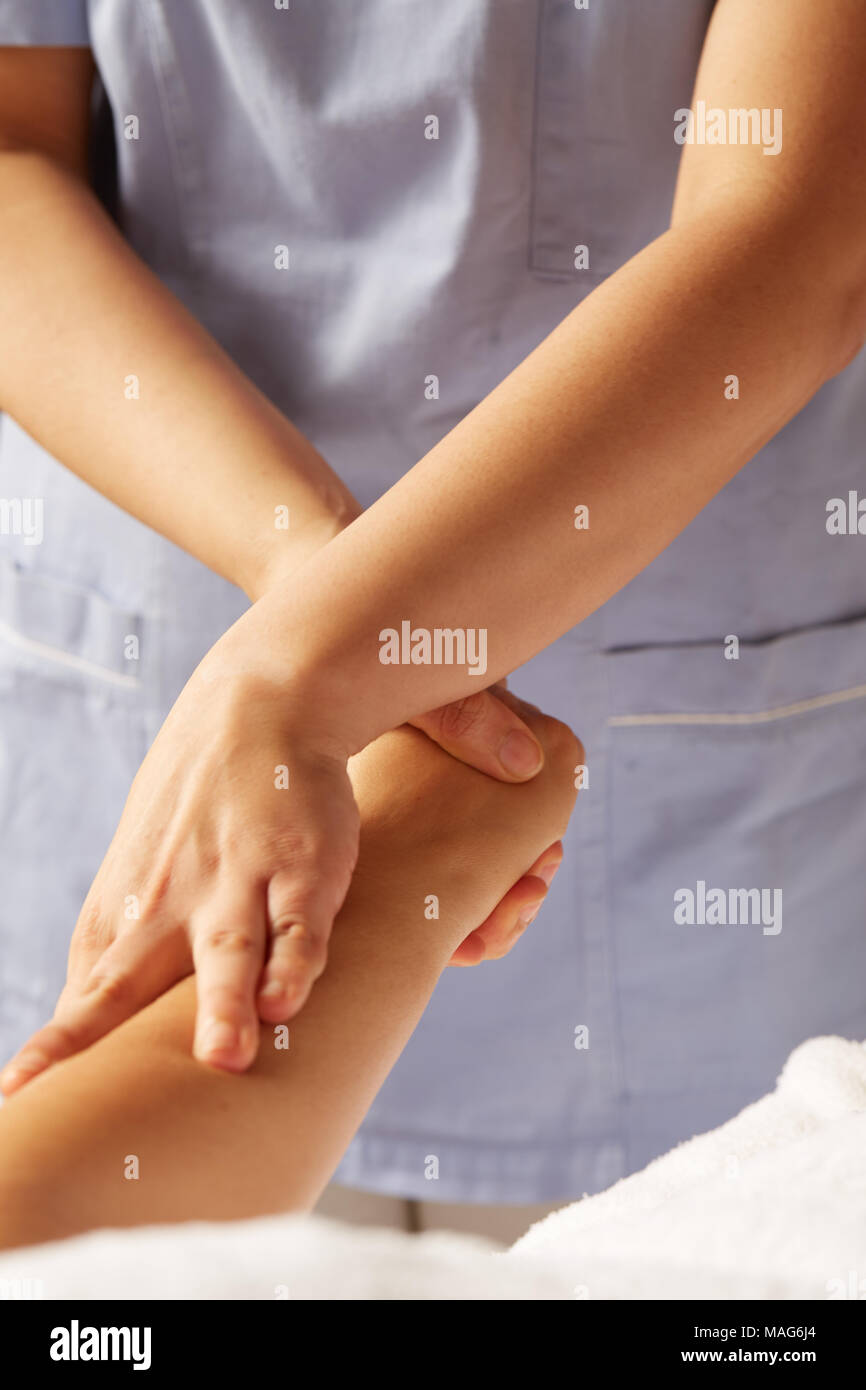 Arms massage at beauty spa salon Stock Photo - Alamy