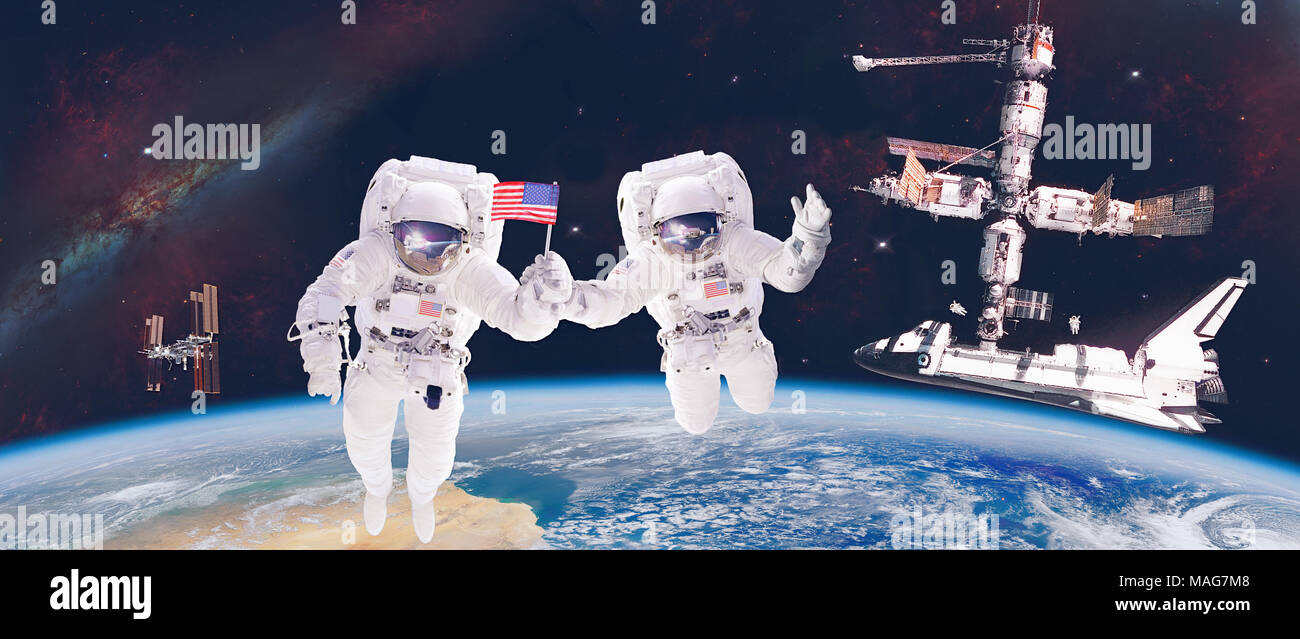 View of the Remote Manipulator System (RMS) end effector over an Earth ...