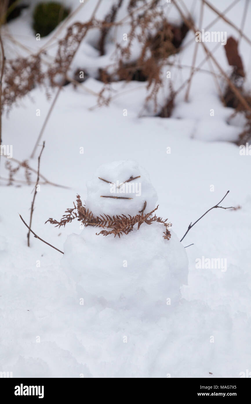 Evil looking miniature snowman in Dalgety Bay Fife Scotland Stock Photo ...