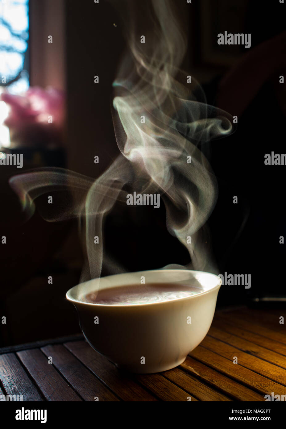 A cup of tea with steam, at the Tea drinking party Stock Photo - Alamy