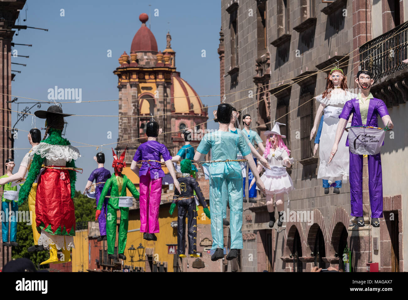 Paper doll effigies hang in the Plaza Allende in preparation for the ...