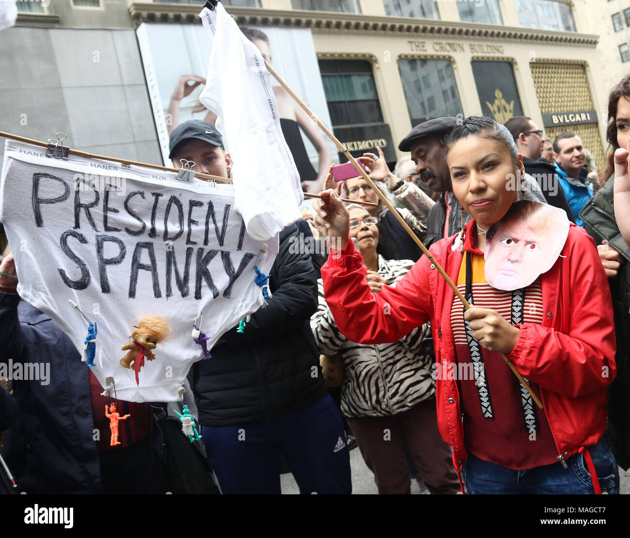New York City, New York, USA. 1st Apr, 2018. A parade goers attends the ...