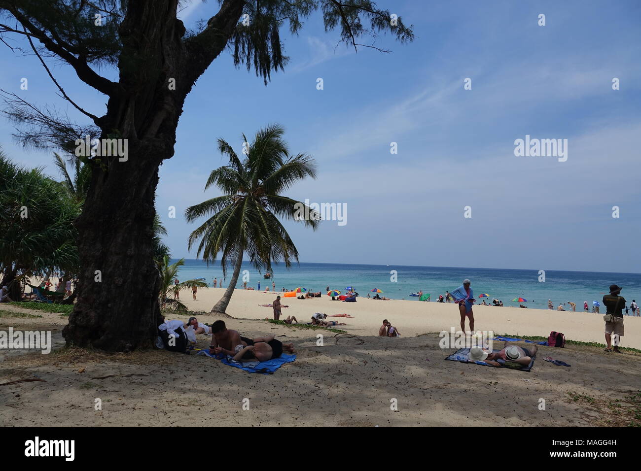 14 March 2018, Thailand, Karon Beach: Tourists sunbathing in Karon ...