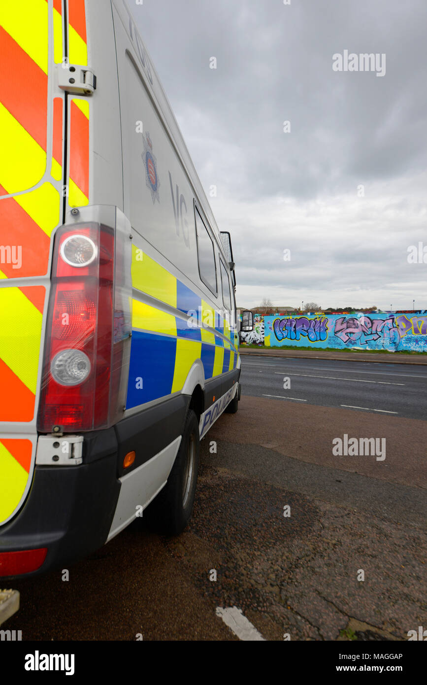 Police van parked by graffiti covered hoarding on Southend on Sea ...