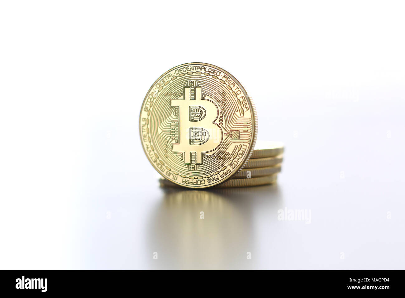 Golden Bitcoin facing the camera in sharp focus, close-up. Virtual ...