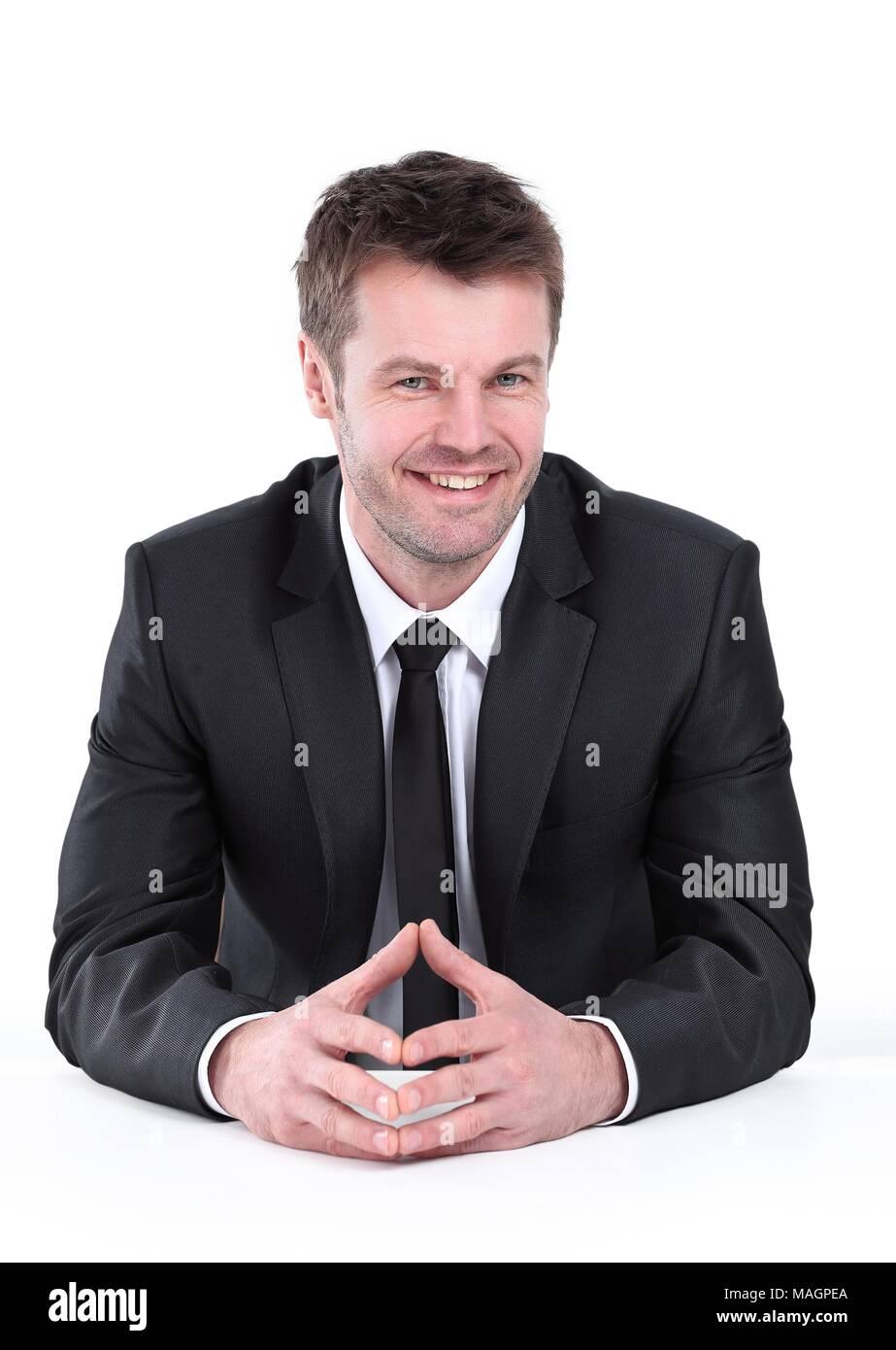 Content businessman sitting table Cut Out Stock Images & Pictures - Alamy