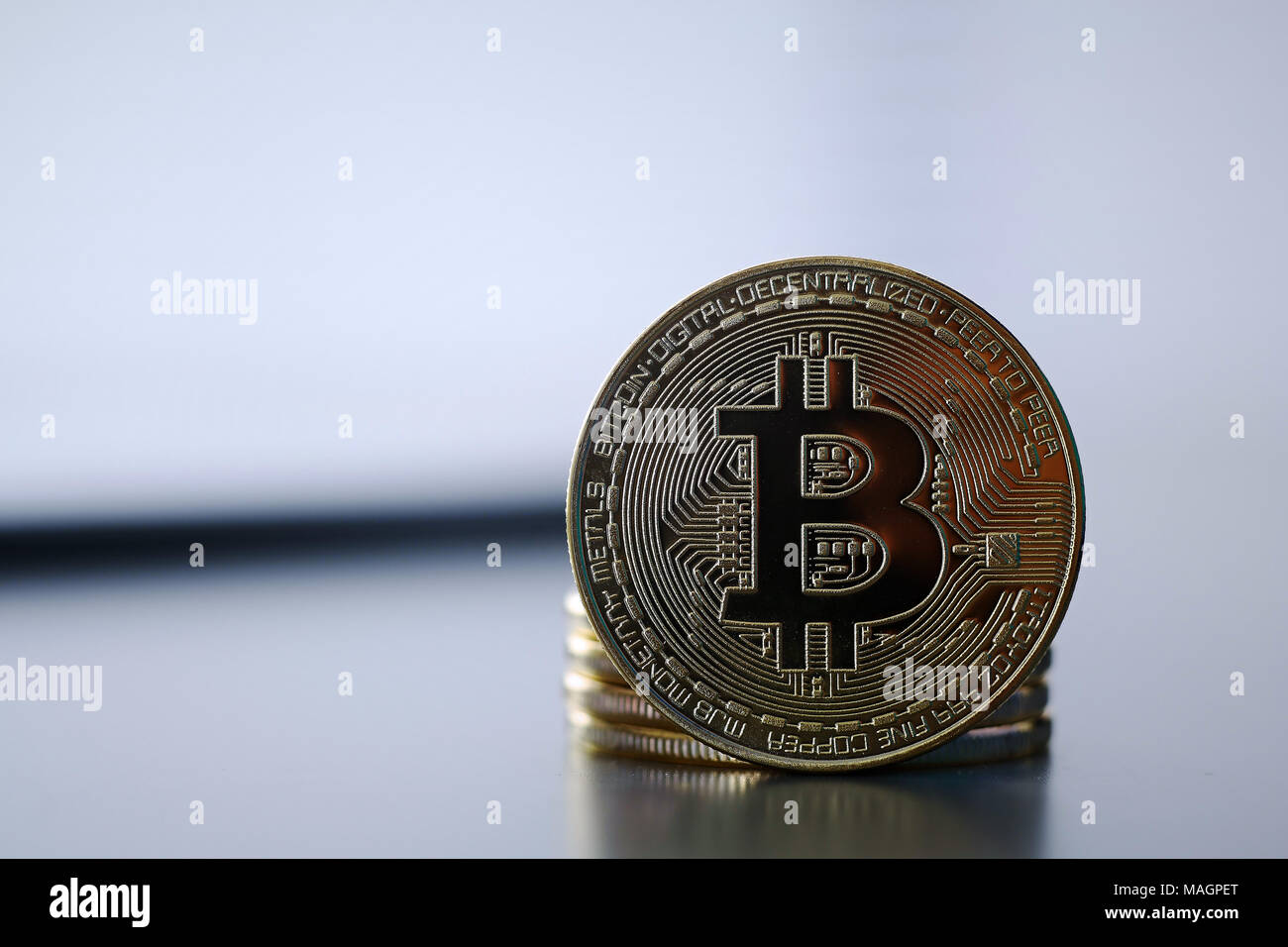 Golden Bitcoin facing the camera in sharp focus, closeup. Virtual ...