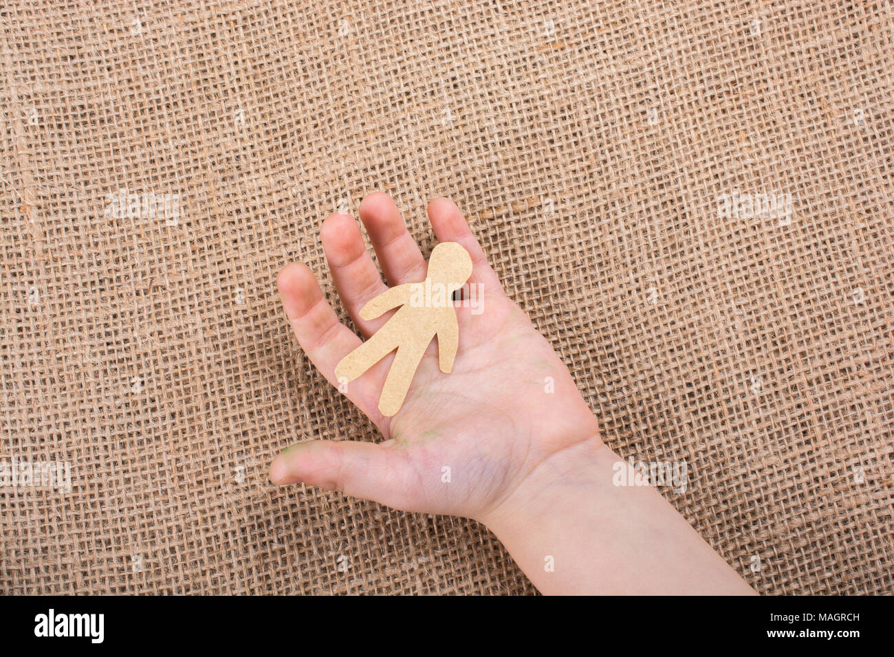 Man shape cut out of paper in the view Stock Photo - Alamy