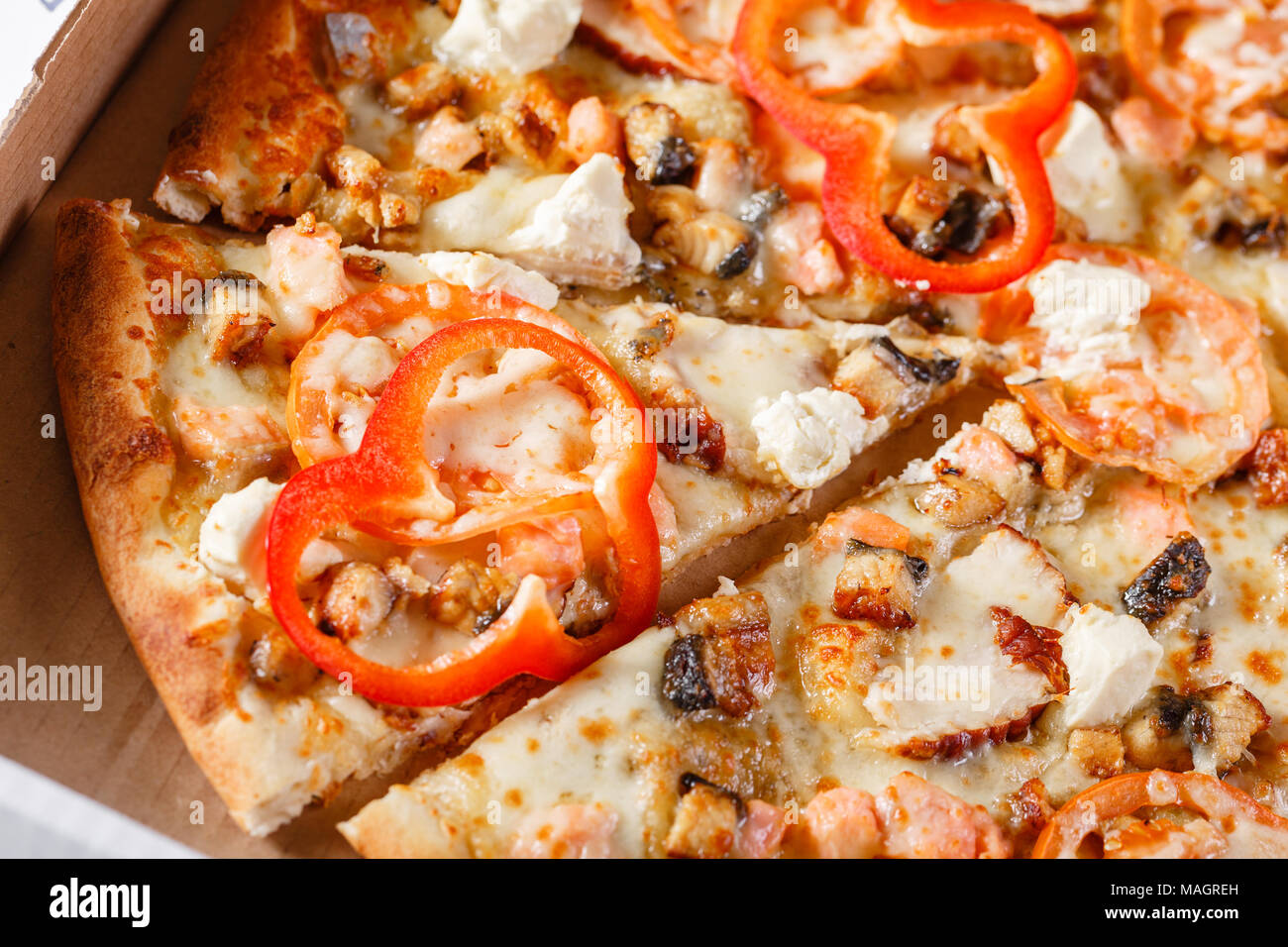 Pizza box delivery concept. Open box with hot tasty italian sliced ...