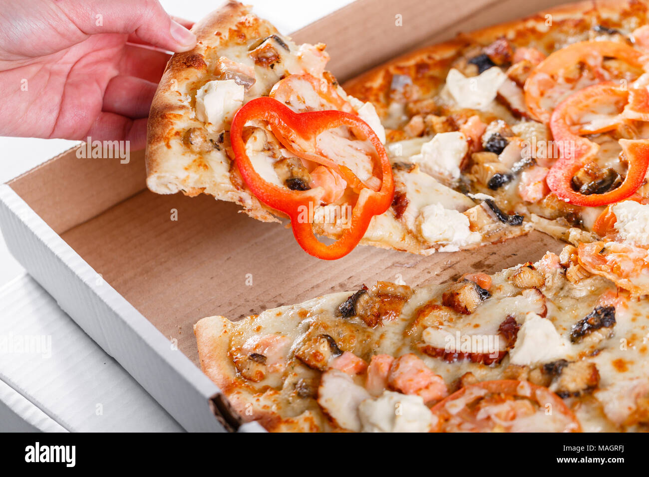 Pizza box delivery concept. Open box with hot tasty italian sliced ...
