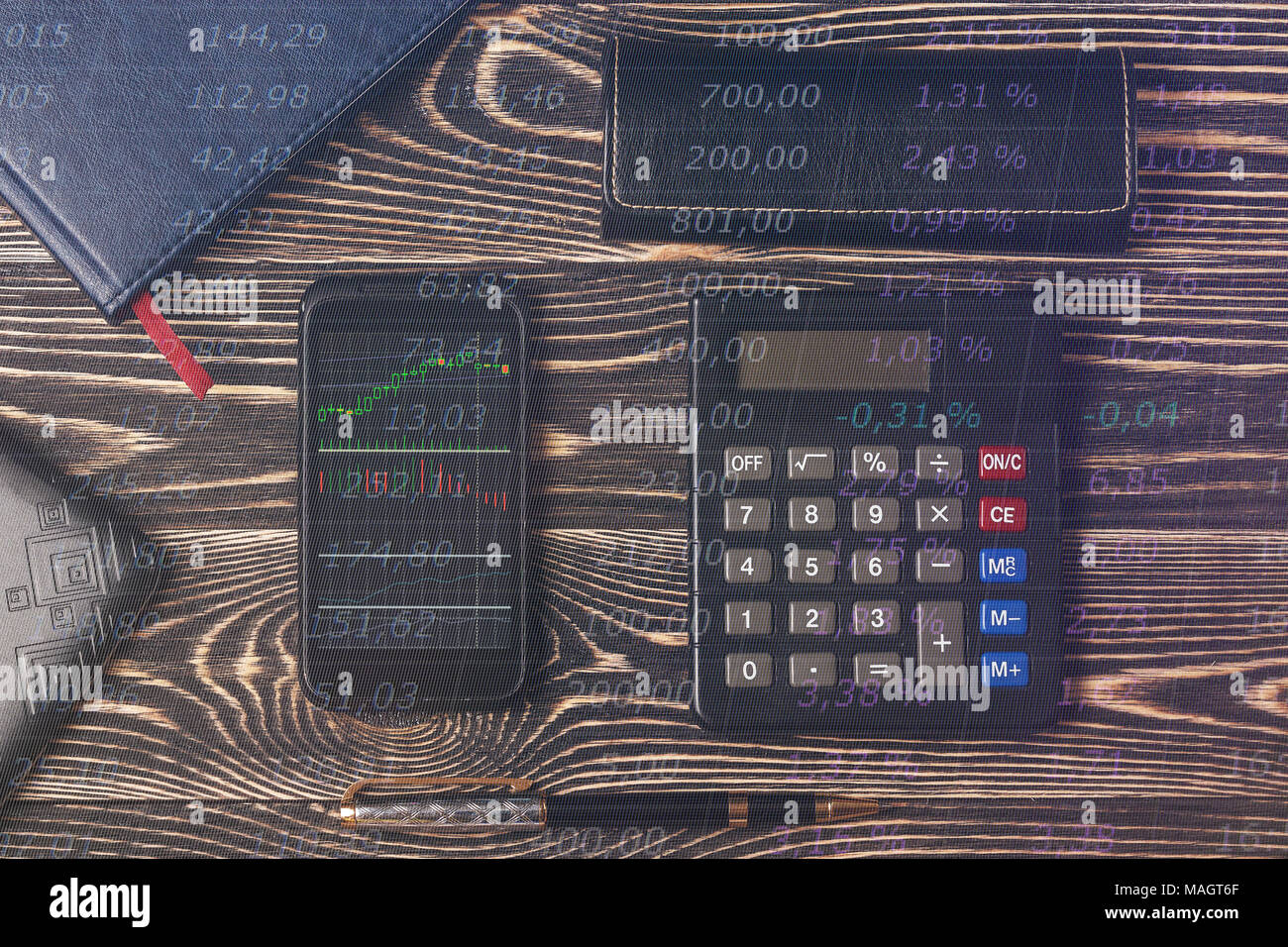 Smartphone with Stock Graph, Notebook, Laptop Keyboard on Wooden Desk ...