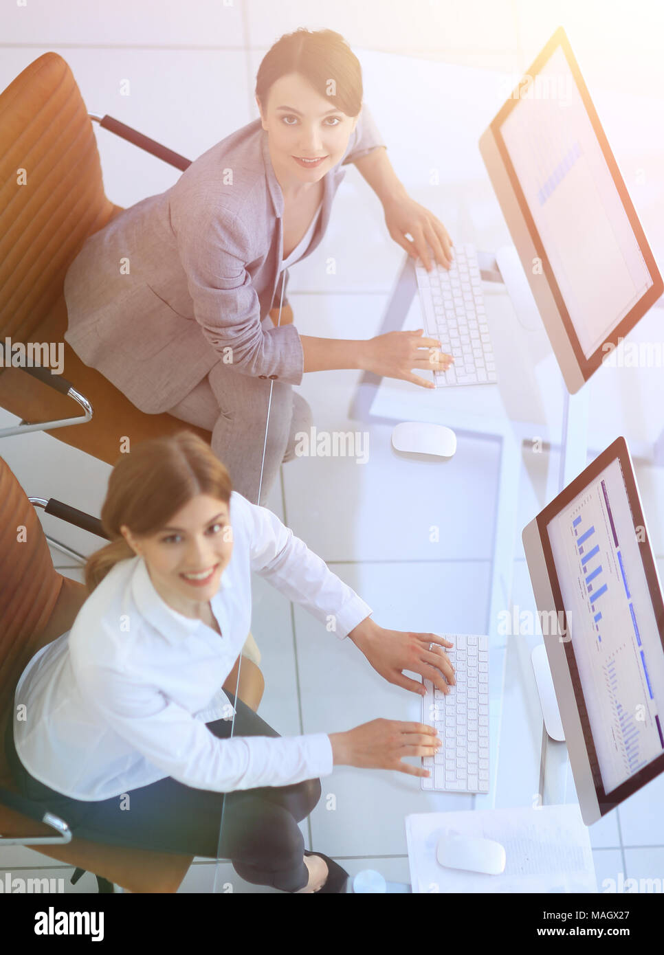 staff of the planning Department sitting behind a Desk and looki Stock ...