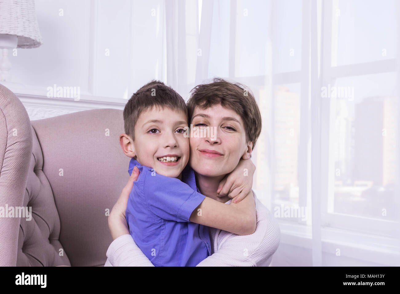 Mother's Day concept: Happy smiling mother and son Stock Photo - Alamy