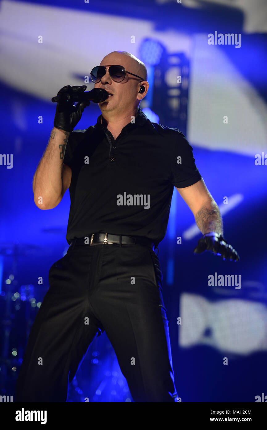 MIAMI, FL - NOVEMBER 05: Pitbull performs on stage at iHeartRadio ...