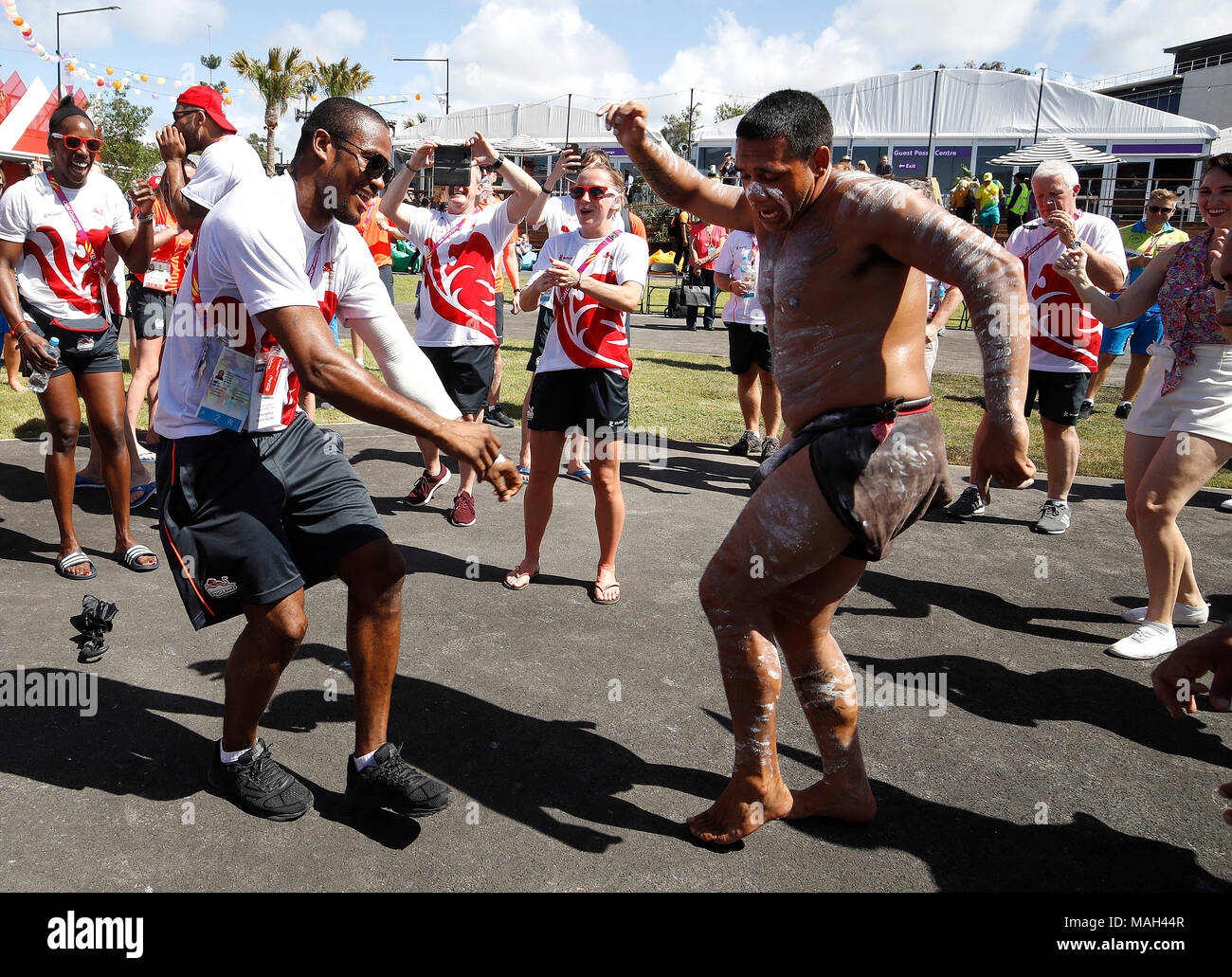 Team England boxers Cheavon Clarke (centre) dances with Aboriginal ...
