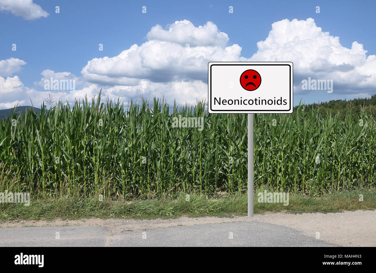 Sign sad Smiley for neonics Stock Photo - Alamy