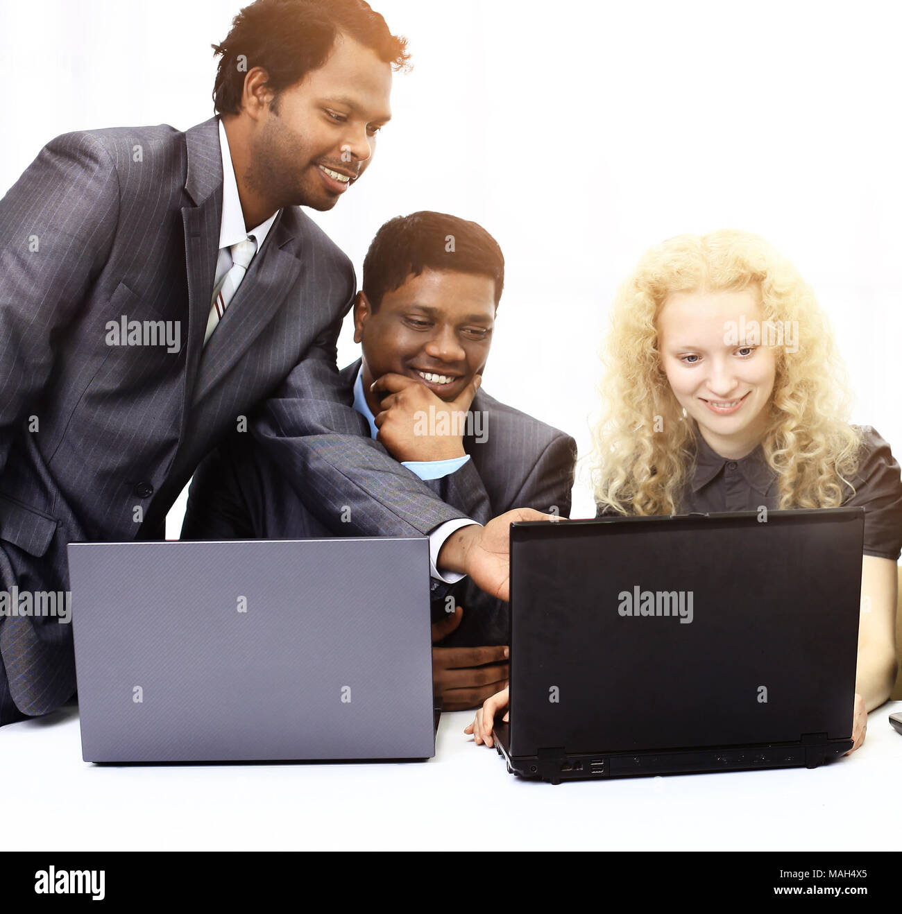 business team discussing new ideas using the laptop Stock Photo - Alamy