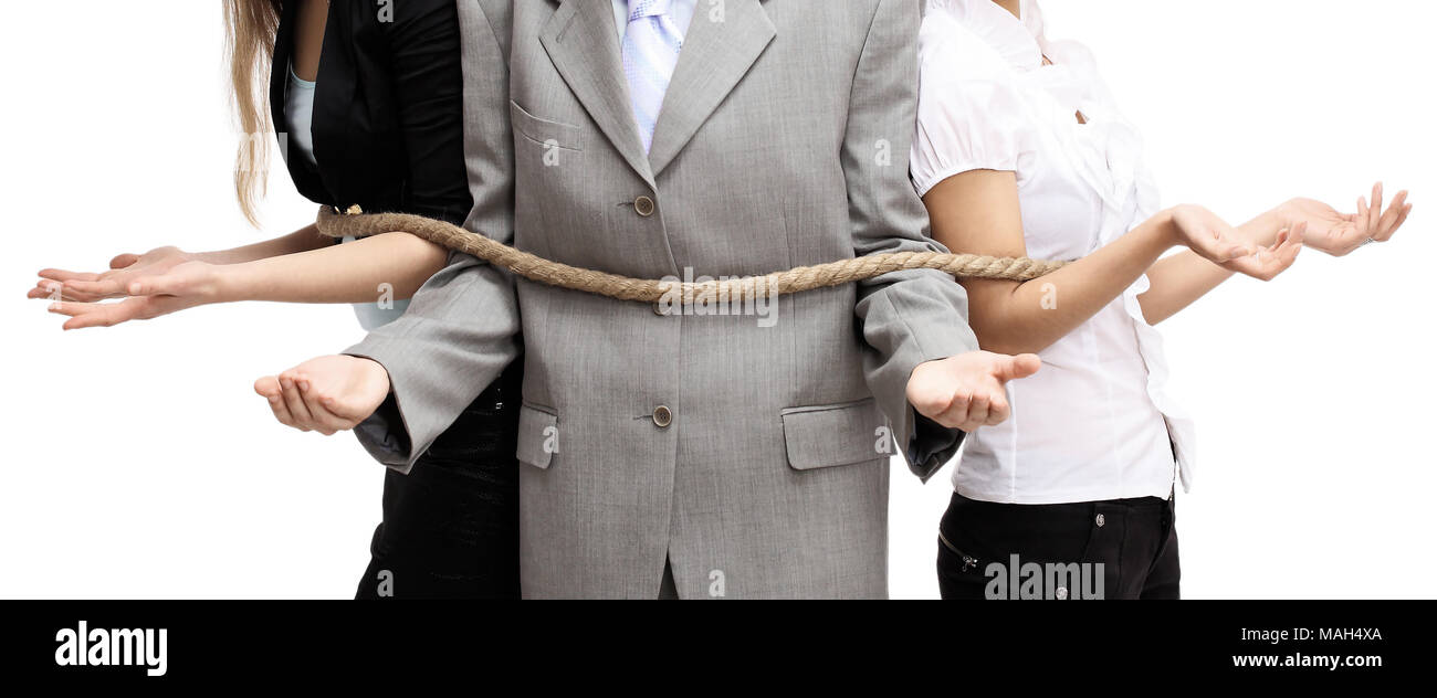 close up.business team tied by rope Stock Photo - Alamy